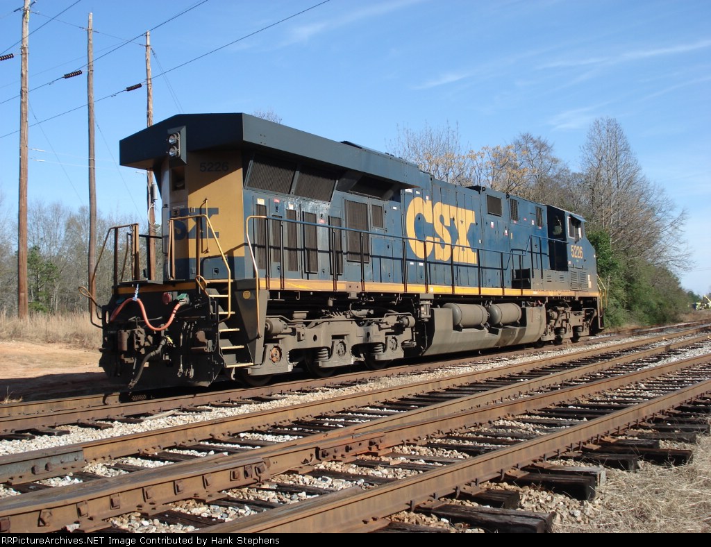 CSX 5226 rear view as it waits in old AWP transfer yard at LaGrange over Christmas. The unit was ...